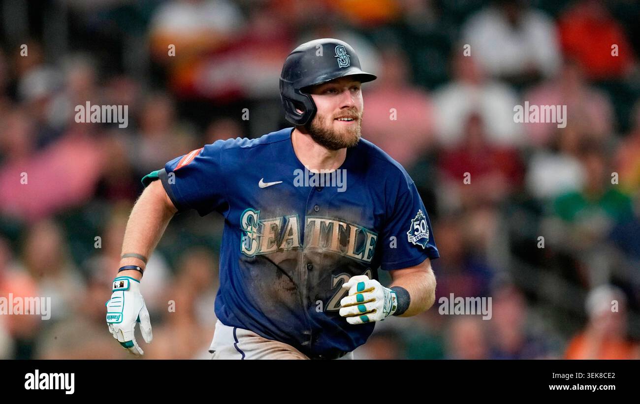 Seattle Mariners' Luke Raley runs up the first base line during a ...