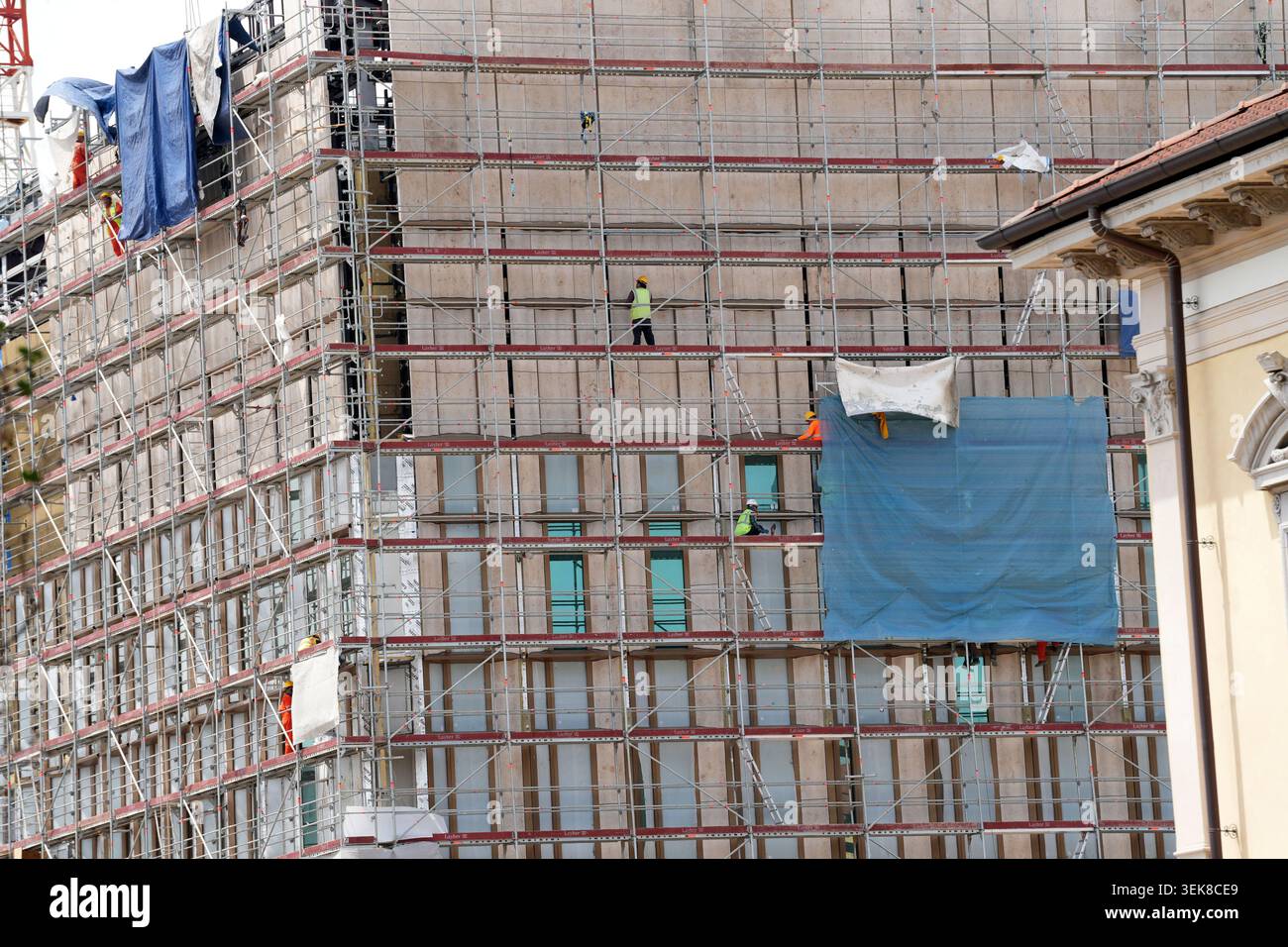 IPA85240962 - Milan, 01-06-26 Indian workers at work in the ...