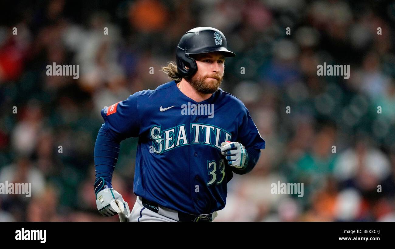 Seattle Mariners' Brendan Donovan runs up the first base line during a ...