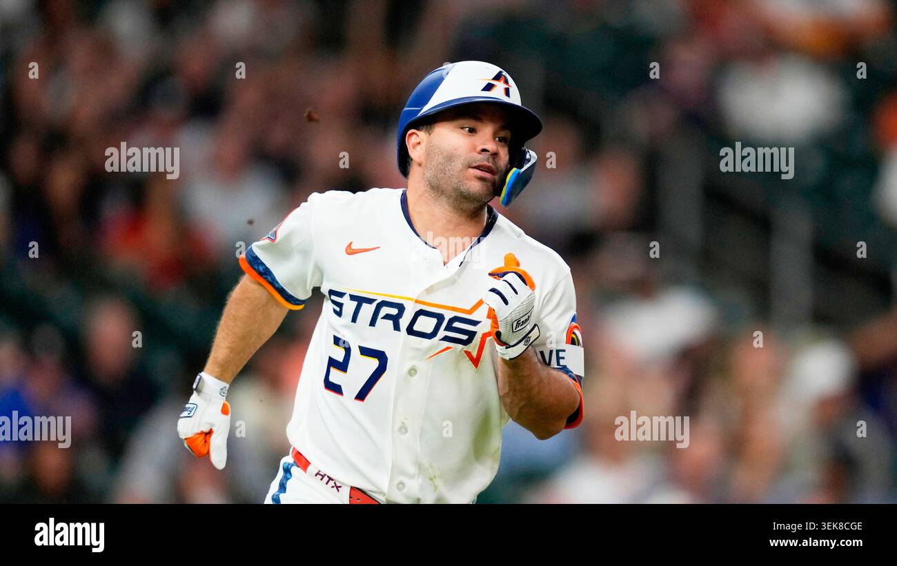 Houston Astros' Jose Altuve runs up the first base line during a ...