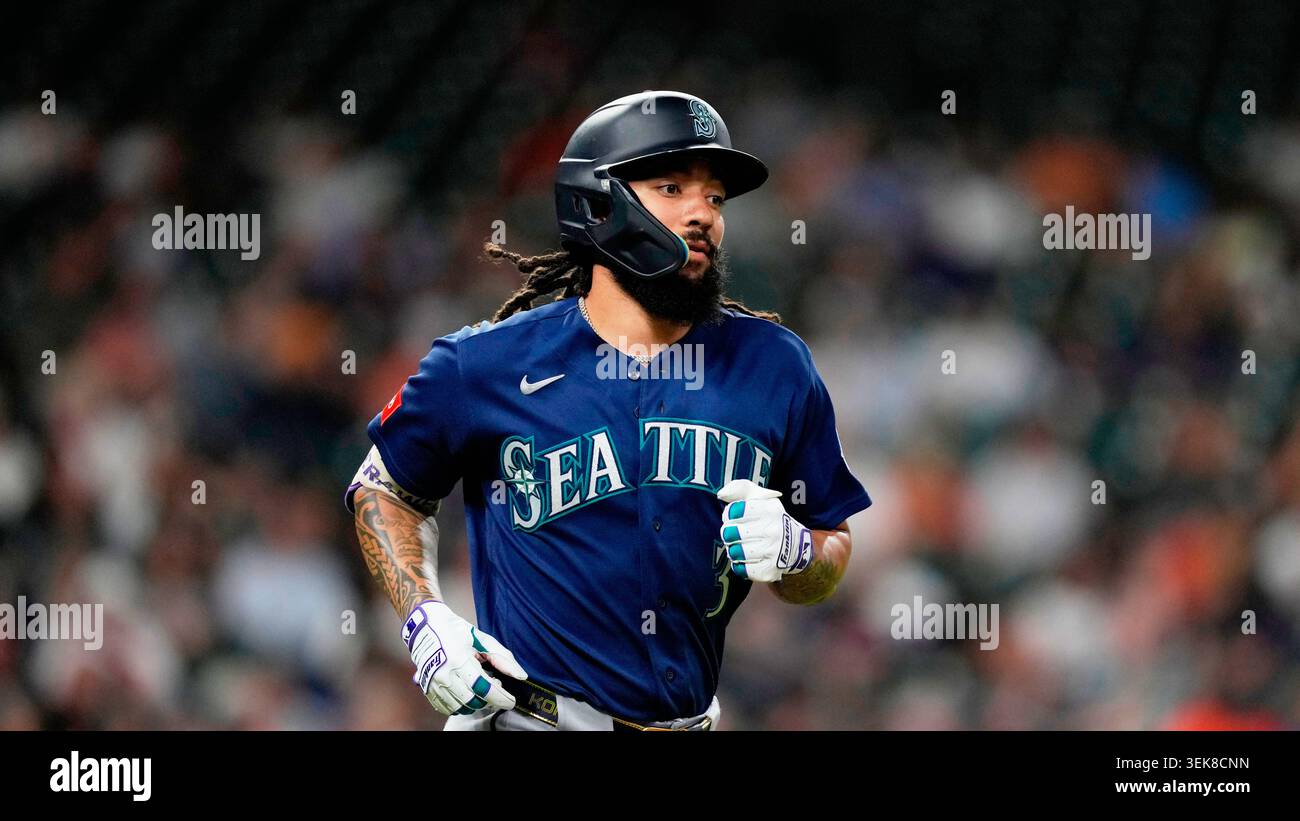 Seattle Mariners' J.P. Crawford runs up the first base line during a ...