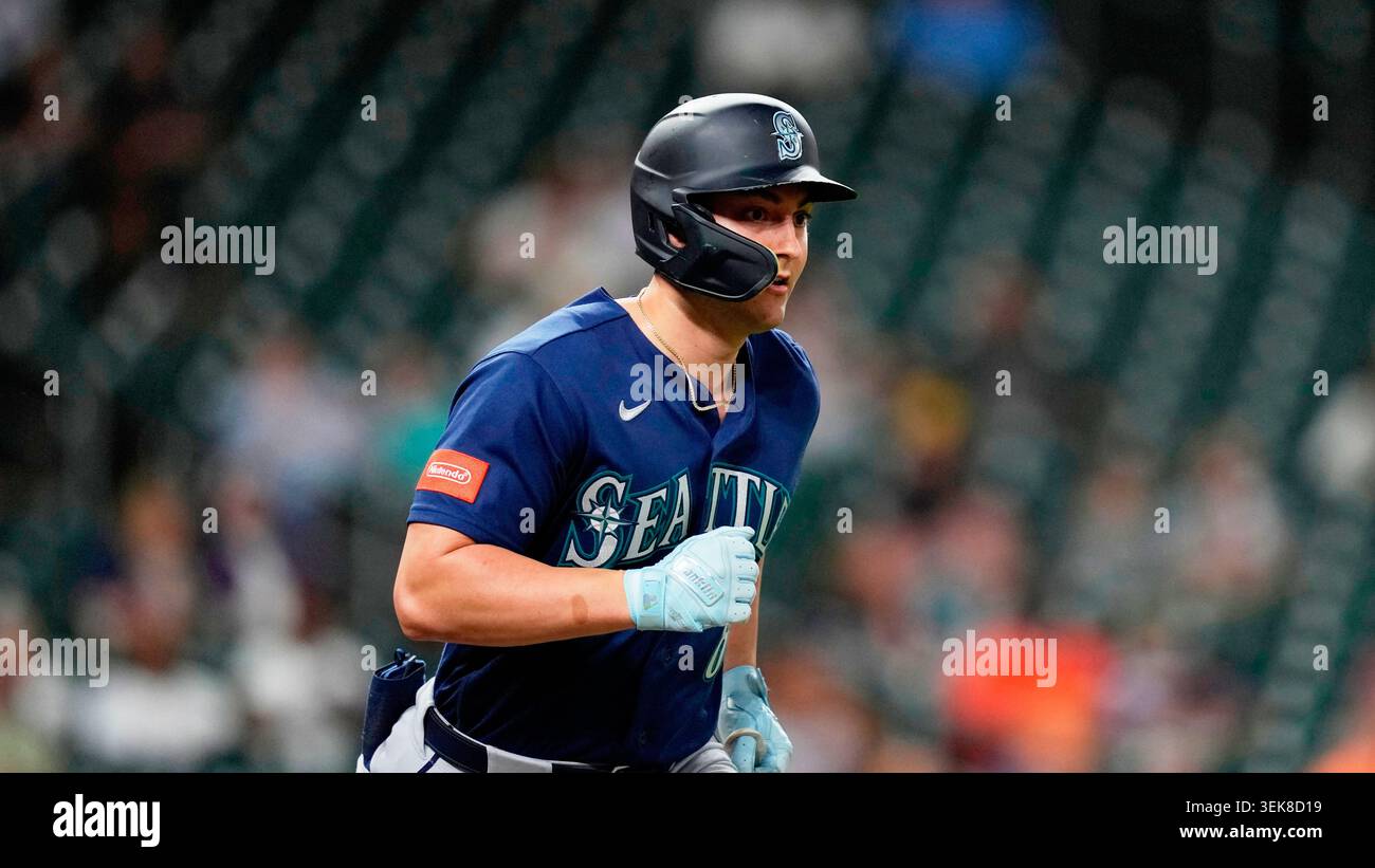 Seattle Mariners' Dominic Canzone runs up the first base line during a ...