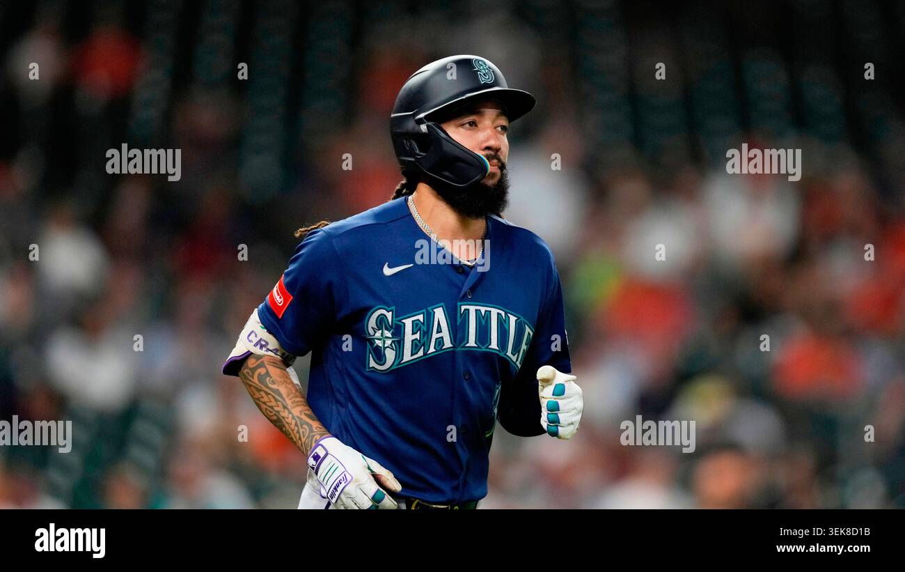 Seattle Mariners' J.P. Crawford runs up the first base line during a ...