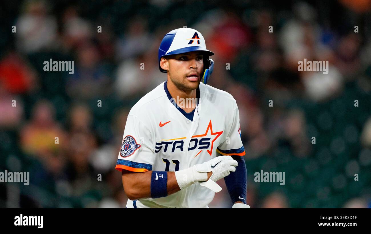 Houston Astros' Cam Smith runs up the first base line during a baseball ...