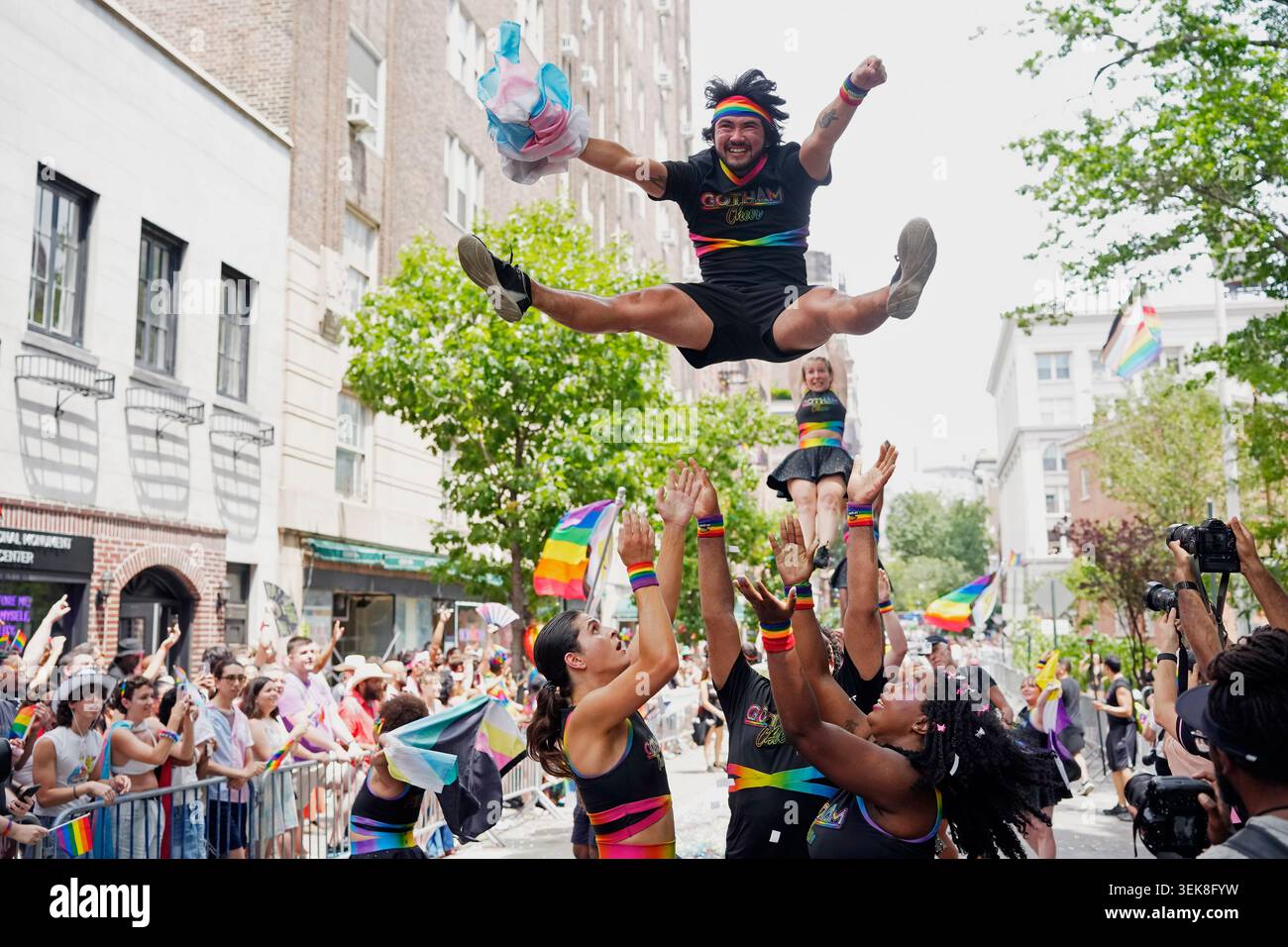 FILE - Members of Gotham Cheer perform during the NYC Pride March on ...
