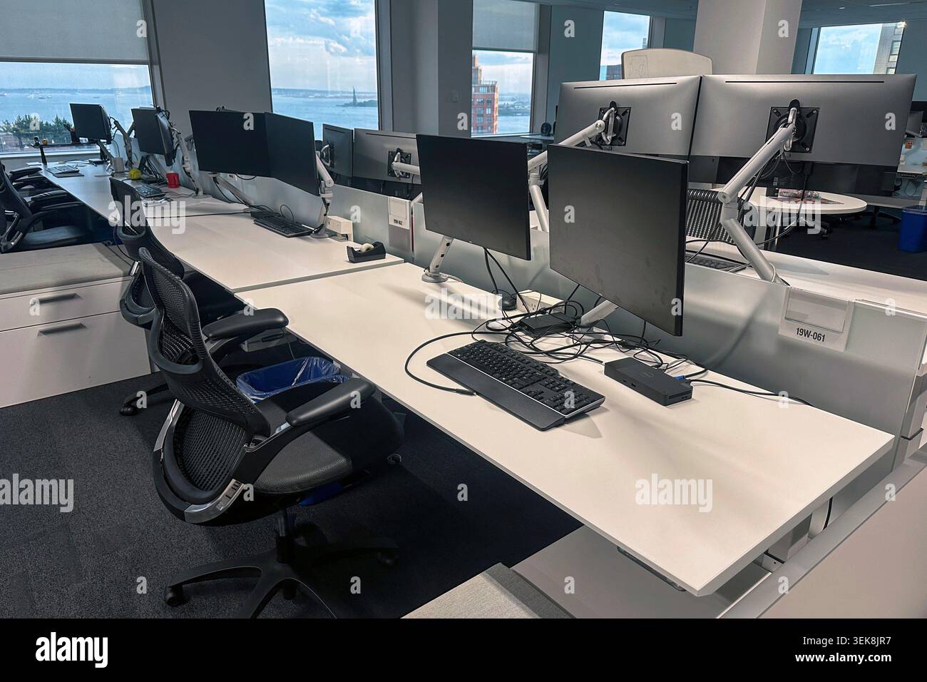 FILE - Empty desks are in an office building in the Manhattan borough ...