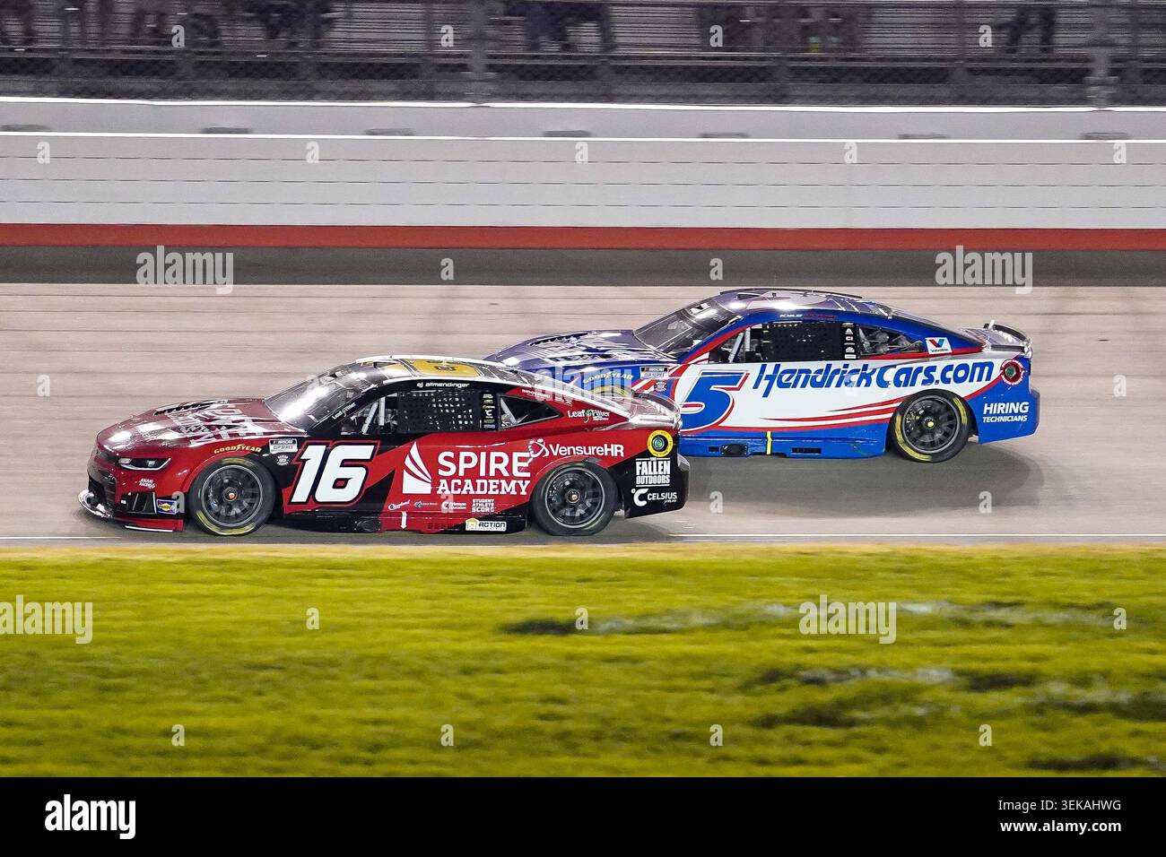 AJ Allmendinger (16) leads Kyle Larson (5) during a NASCAR Cup Series ...