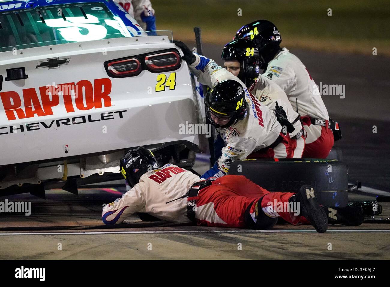 The pit crew for William Byron works on the car during a NASCAR Cup ...