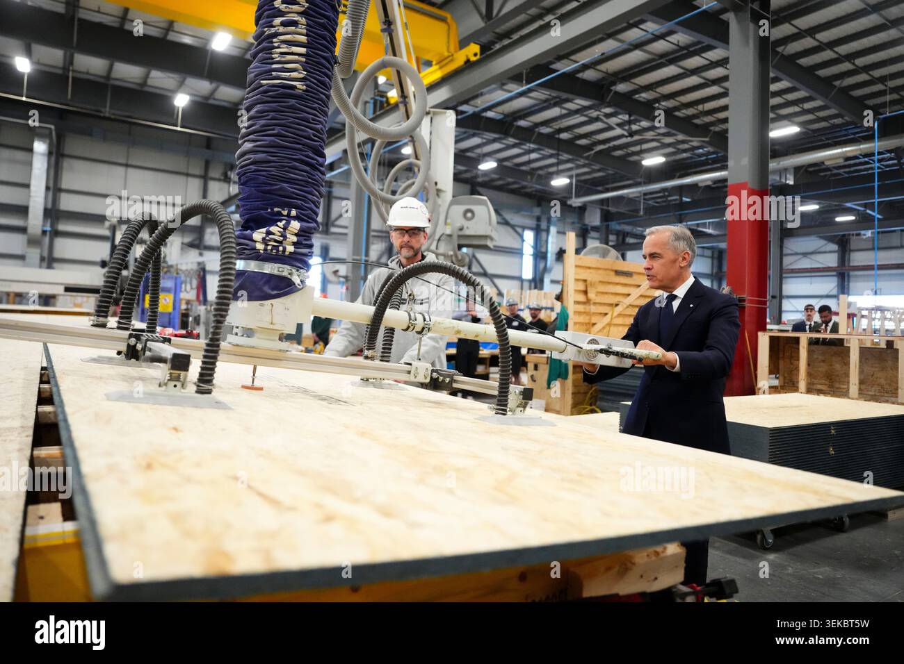 Prime Minister Mark Carney tours a home manufacturing facility in ...
