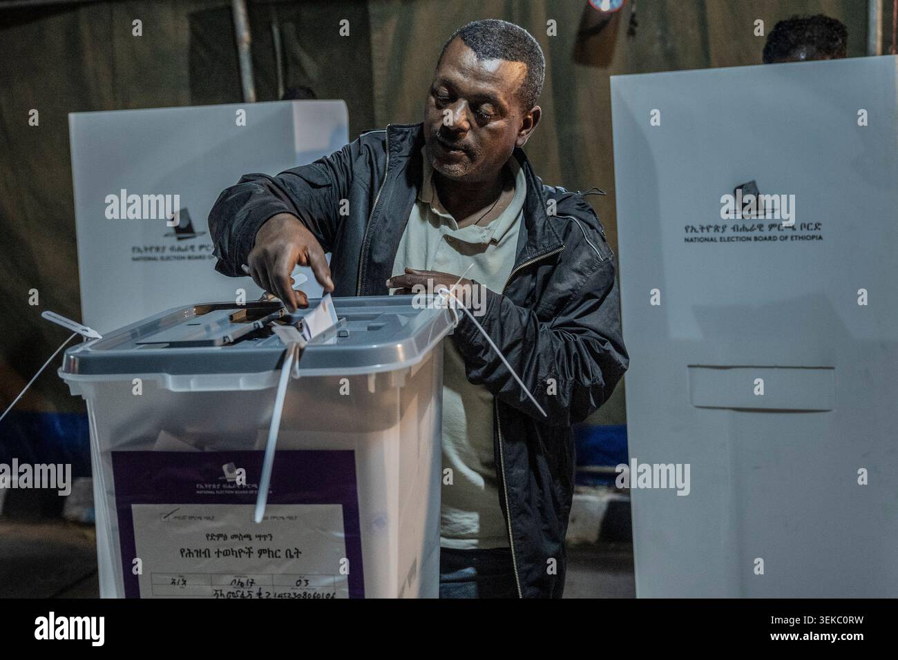 A man casts his ballot during the general election in Addis Ababa ...