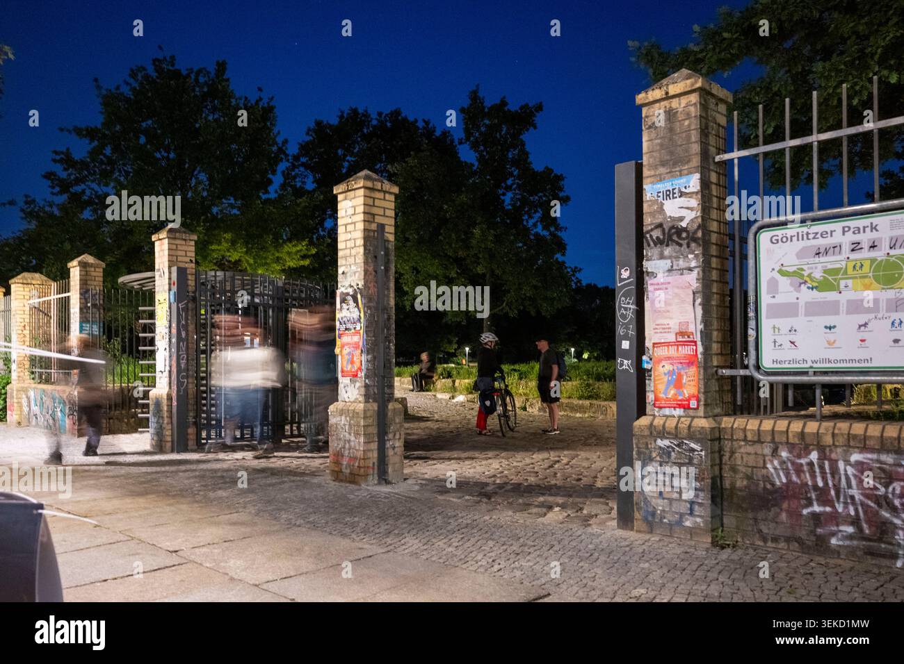01 June 2026, Berlin: People walk through an open gate in Görlitzer ...
