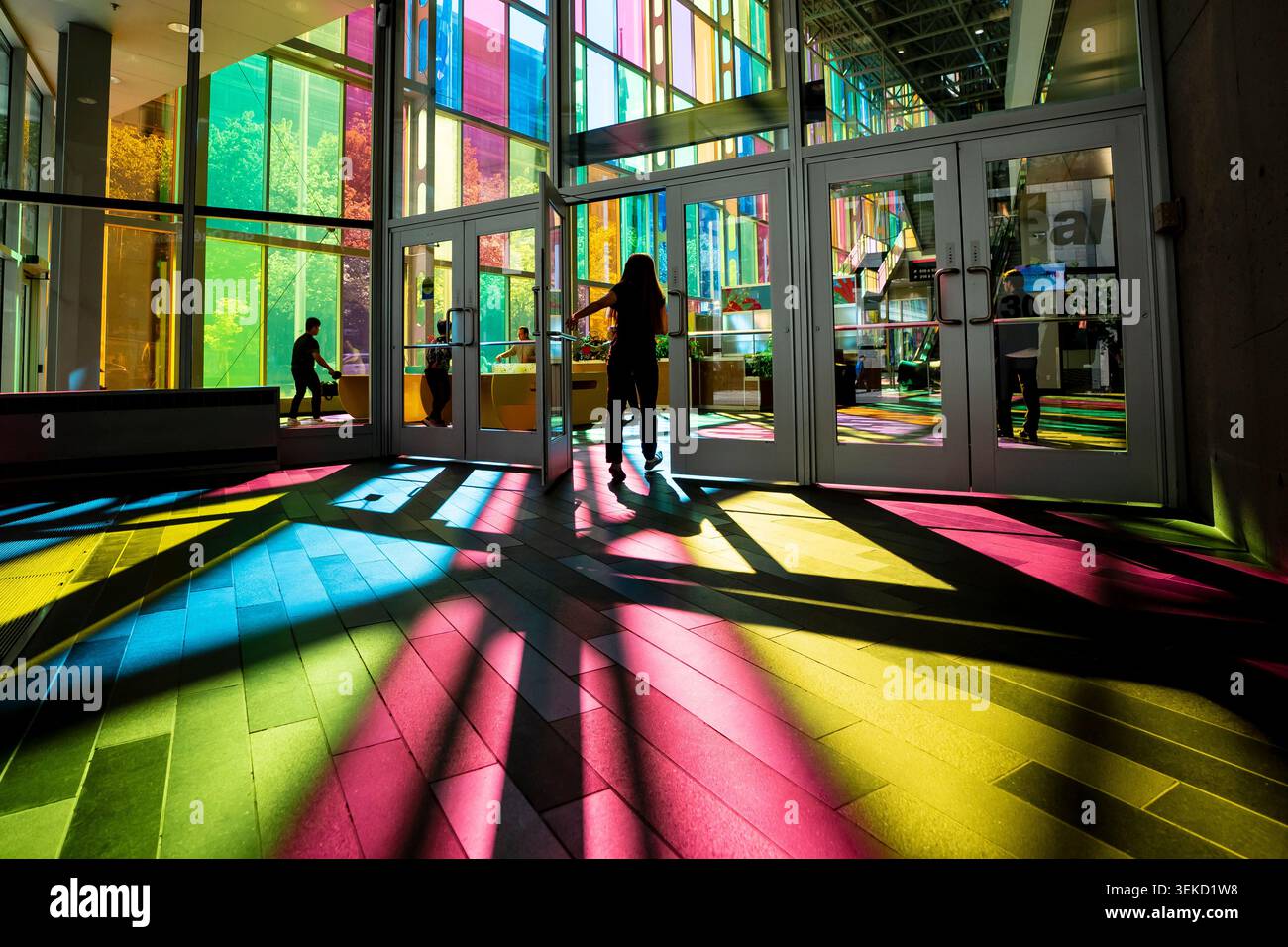 People walk inside the Palais des Congres in Montreal, on Monday, June ...