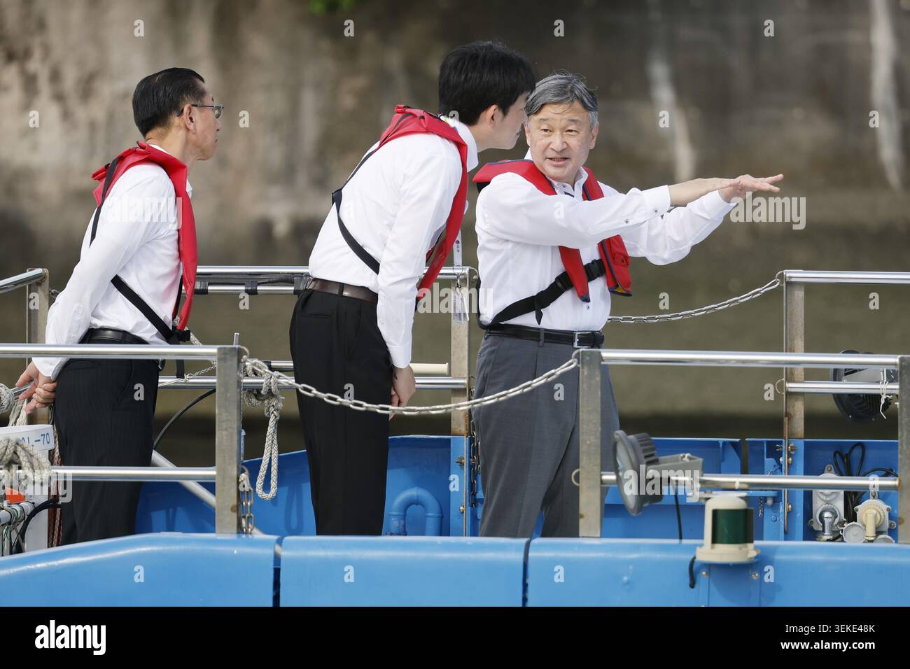 Japanese Emperor Naruhito (R) boards a boat in Tokyo on June 1, 2026 ...