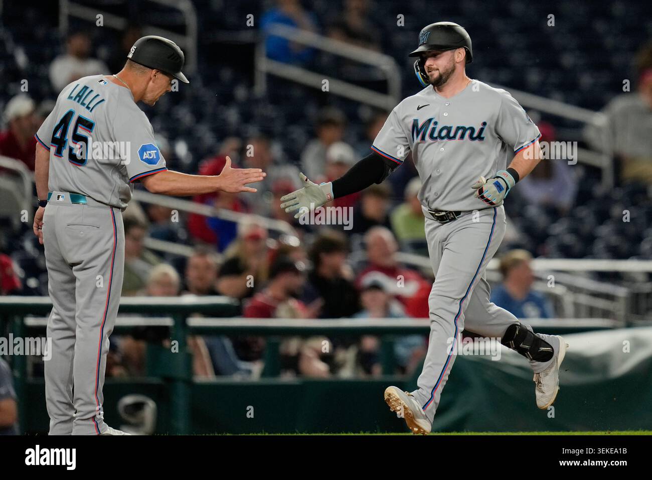 Miami Marlins' Liam Hicks, right, celebrates his home run against the ...