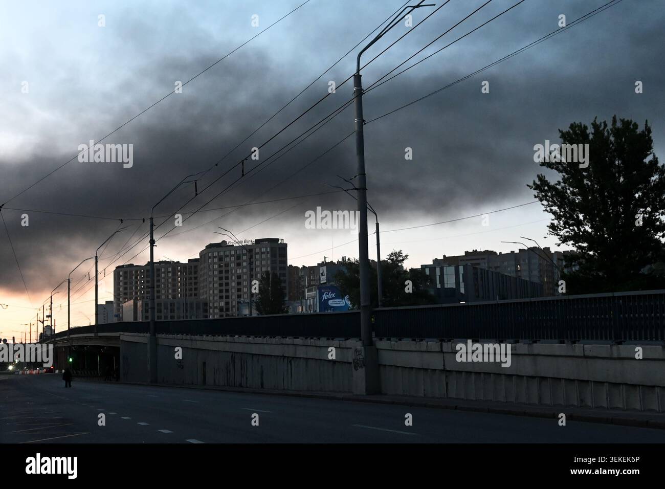 Residential high-rise buildings in Kyiv against the backdrop of black ...