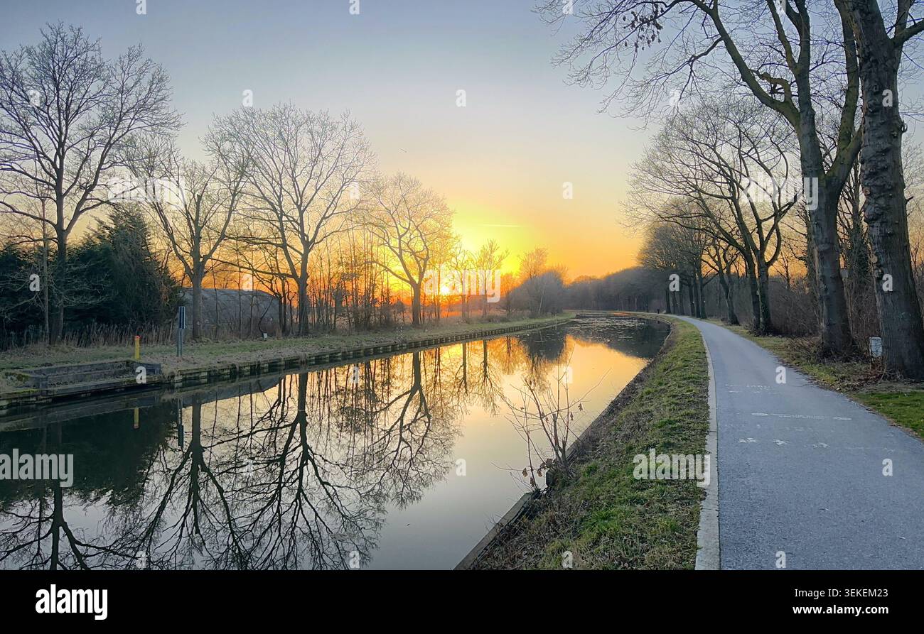A beautiful and tranquil river scene at sunset, showcasing the stunning ...