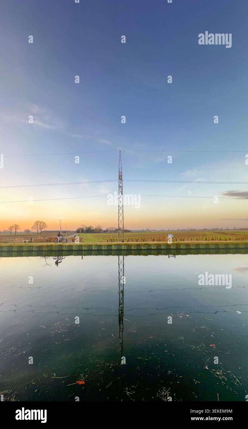 A beautifully tranquil view showcases a towering communication ...