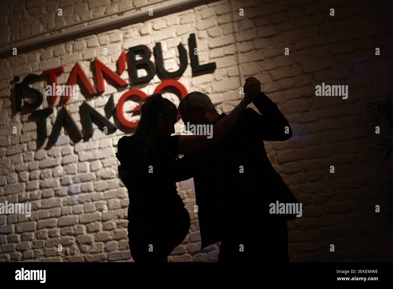 A couple dances tango during a milonga session at 333, a tango studio ...