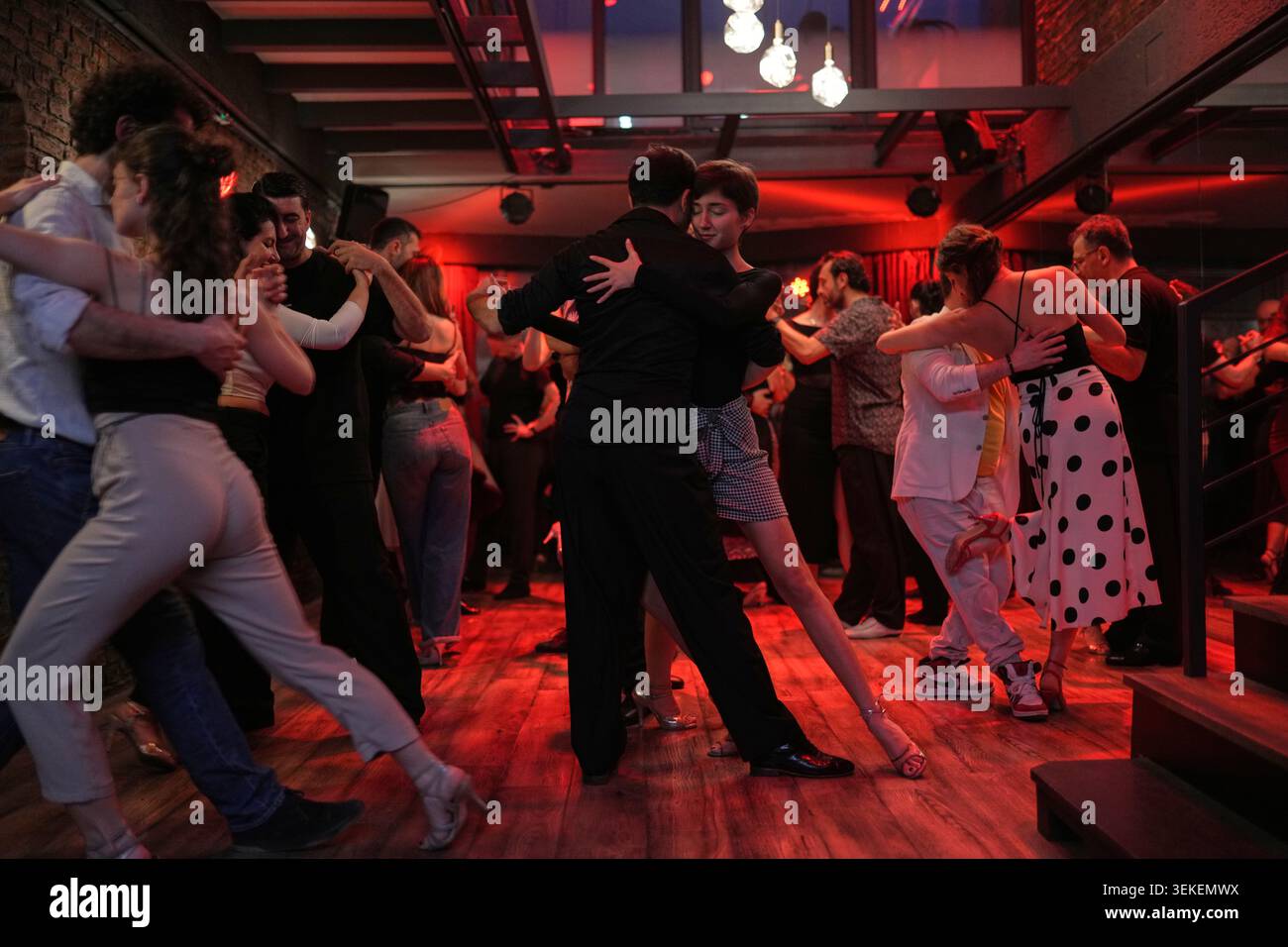 Tango enthusiasts dance during a milonga evening session at La ...