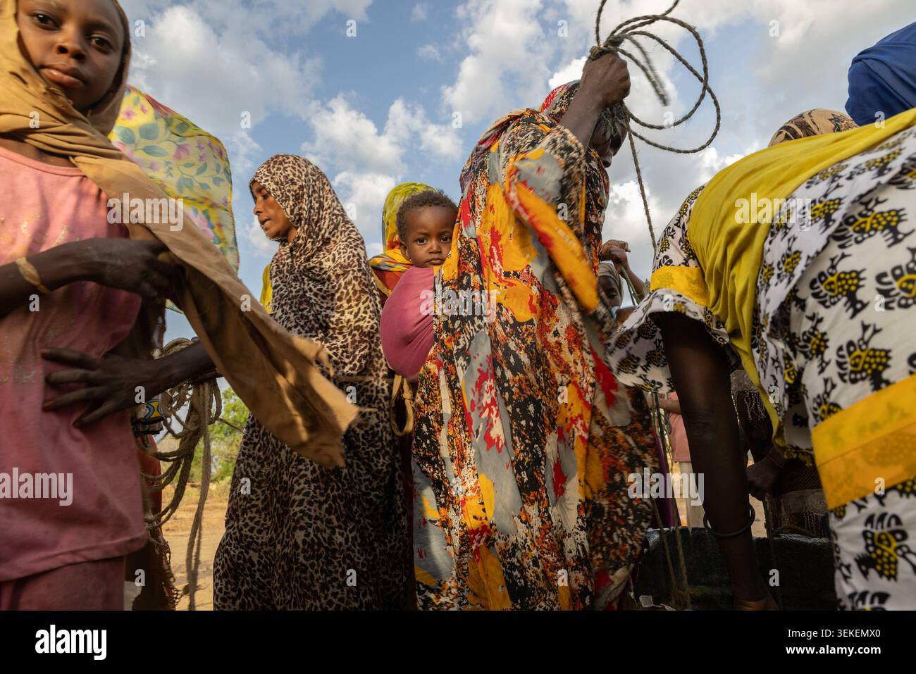Women fetch water at dusk in the Korsi Refugee Camp in Birao, Central ...