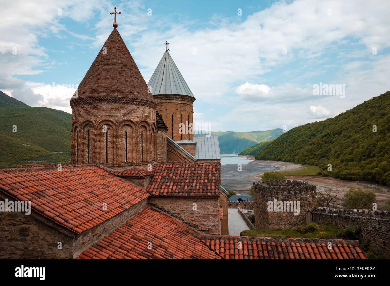 Medieval stone church domes and red tile roofs overlooking scenic ...