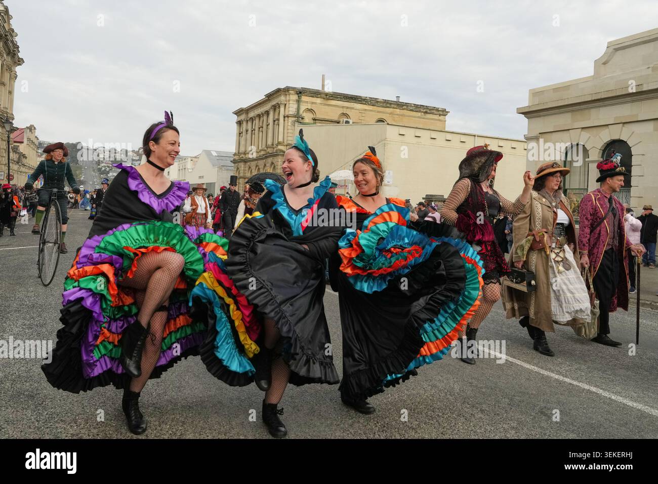 Participants walk in a parade at the Steampunk NZ Festival in Ōamaru ...