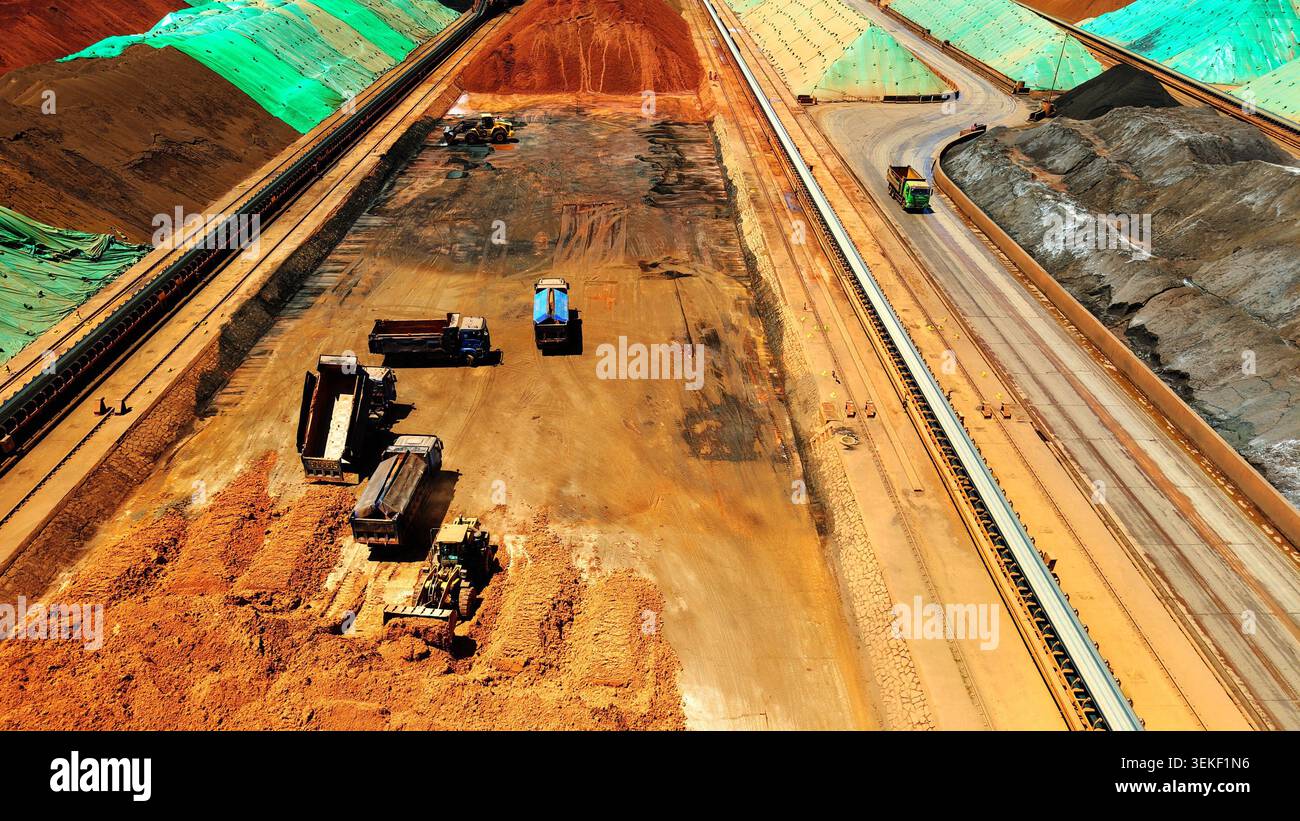 Machinery sorts and transports iron ore at Qingdao Port ore terminal in ...