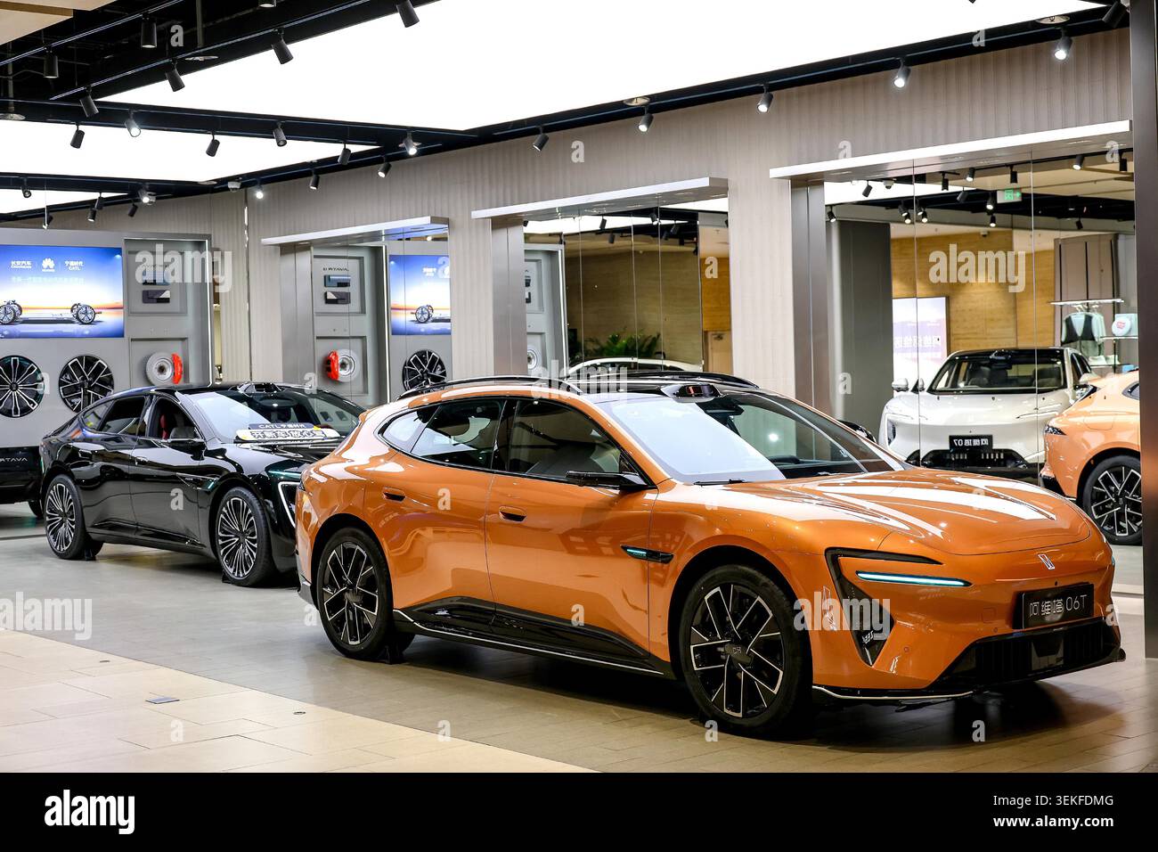 A shopper experiences Avatr new energy vehicles at a shopping mall in ...