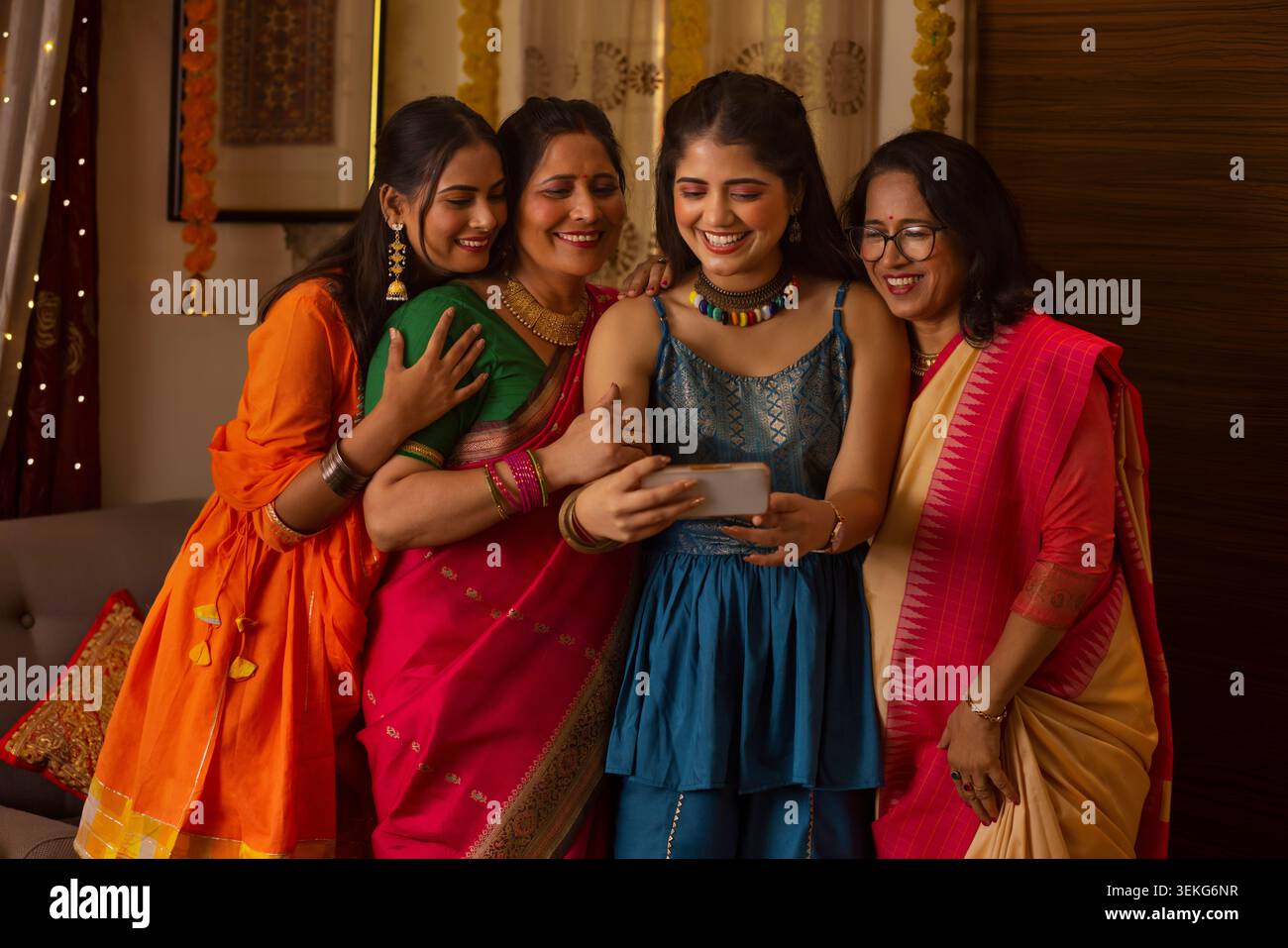 Portrait of three generation family having fun on Diwali at home Stock ...