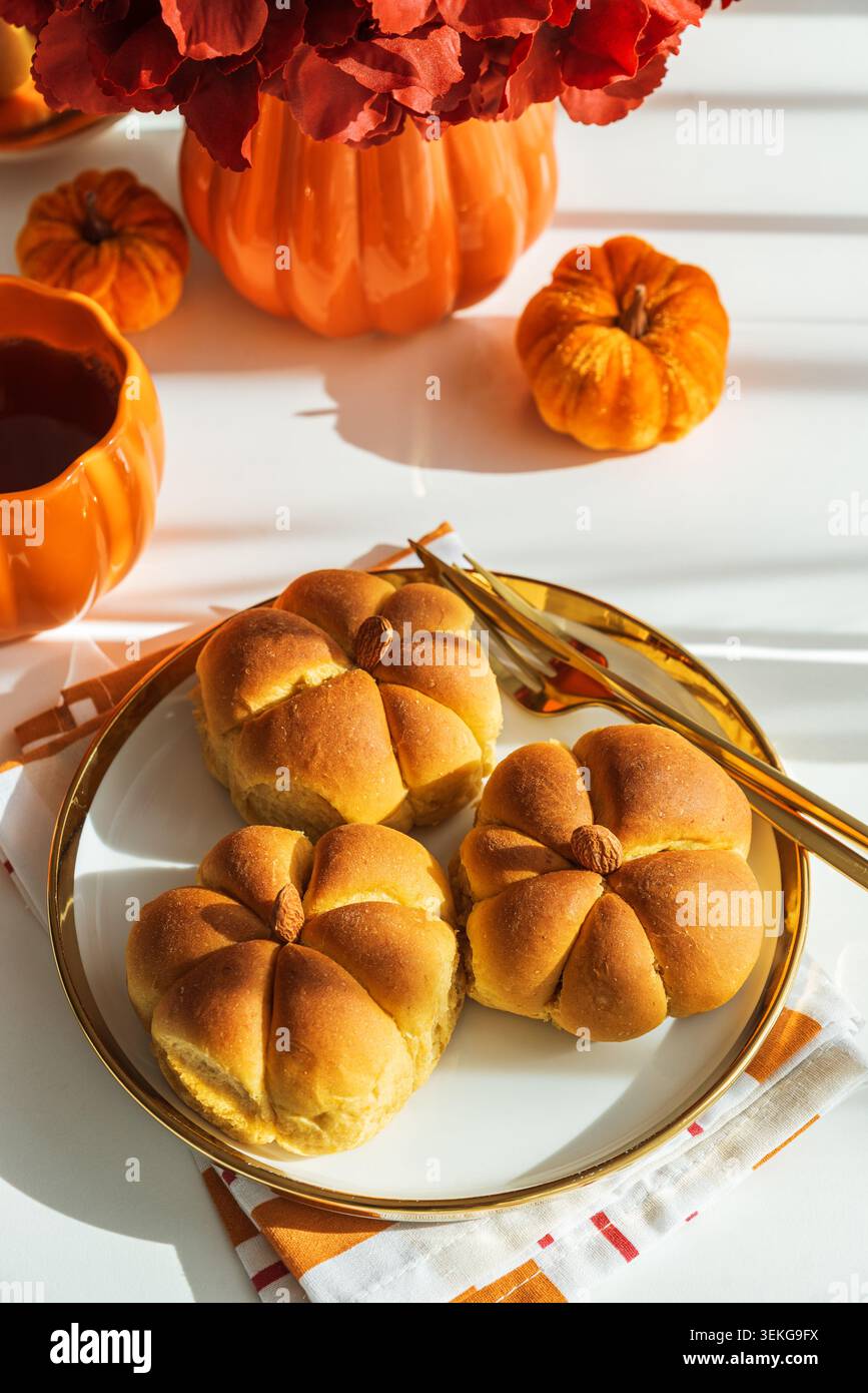 Autumn Table Setting with Pumpkin Shaped Buns with Cinnamon, Mug ...