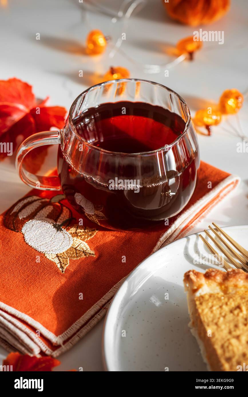 Autumn Table Setting with Pumpkin Pie, Hot Drink, and Seasonal Decor ...