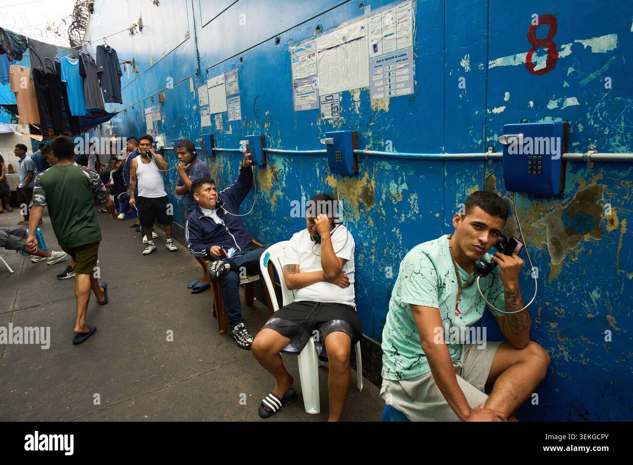Inmates make phone calls at El Milagro Prison in Trujillo, Peru ...