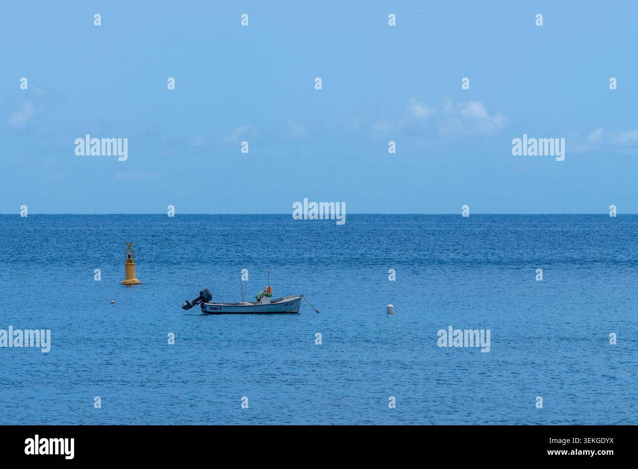Small Lonely Boat Floating in the Sea at El Pajar, Gran Canaria, Spain ...