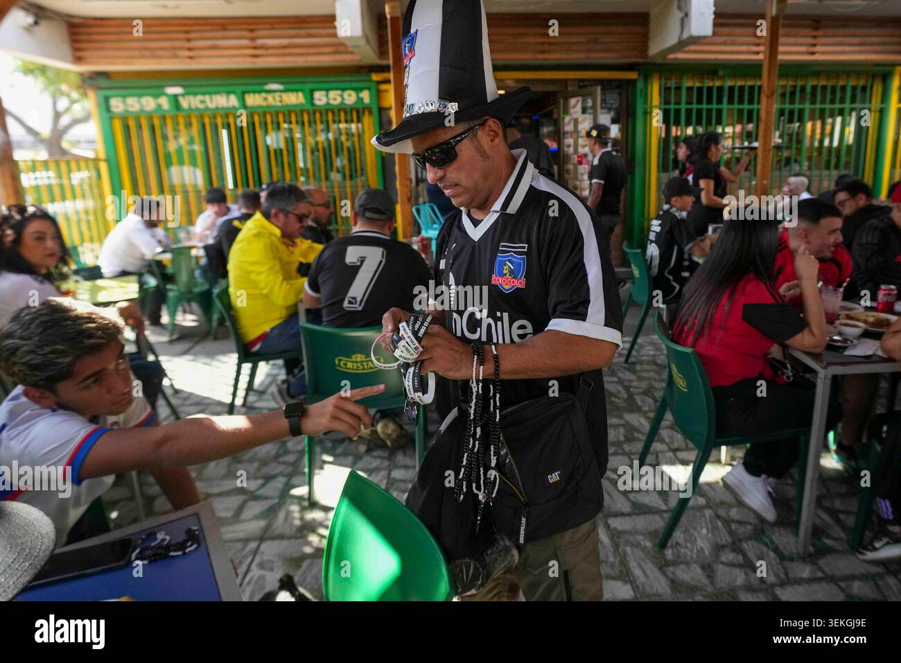 Colo Colo fan Hector Hermosilla, known as Nano, sells handmade prayer ...