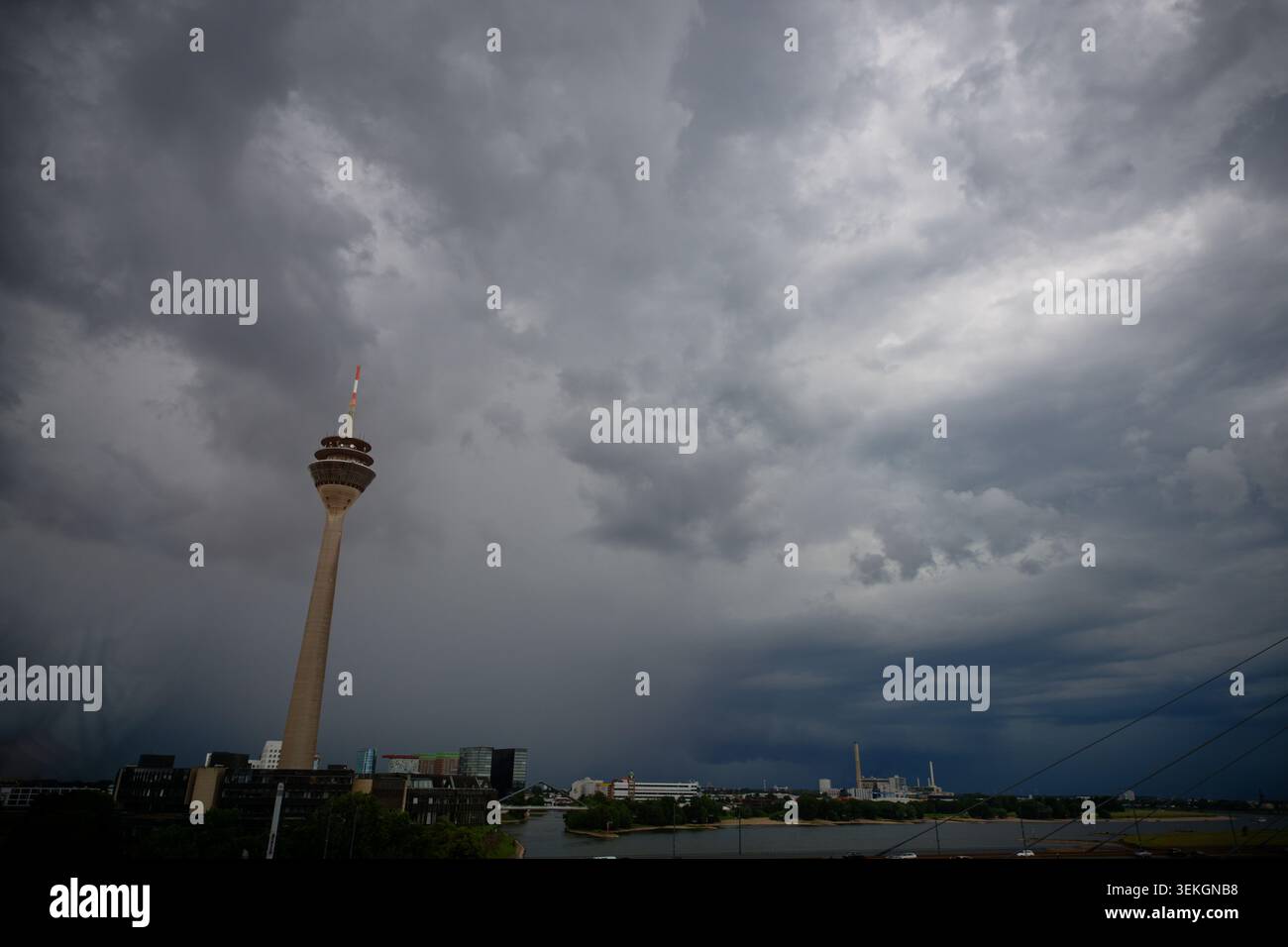 02 June 2026, North Rhine-Westphalia, Duesseldorf: Storm clouds can be ...
