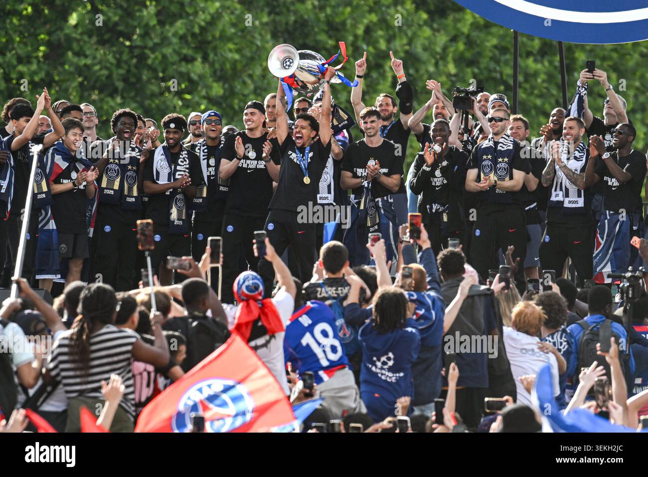 PSG players returning from Budapest parade along the Champs de Mars ...