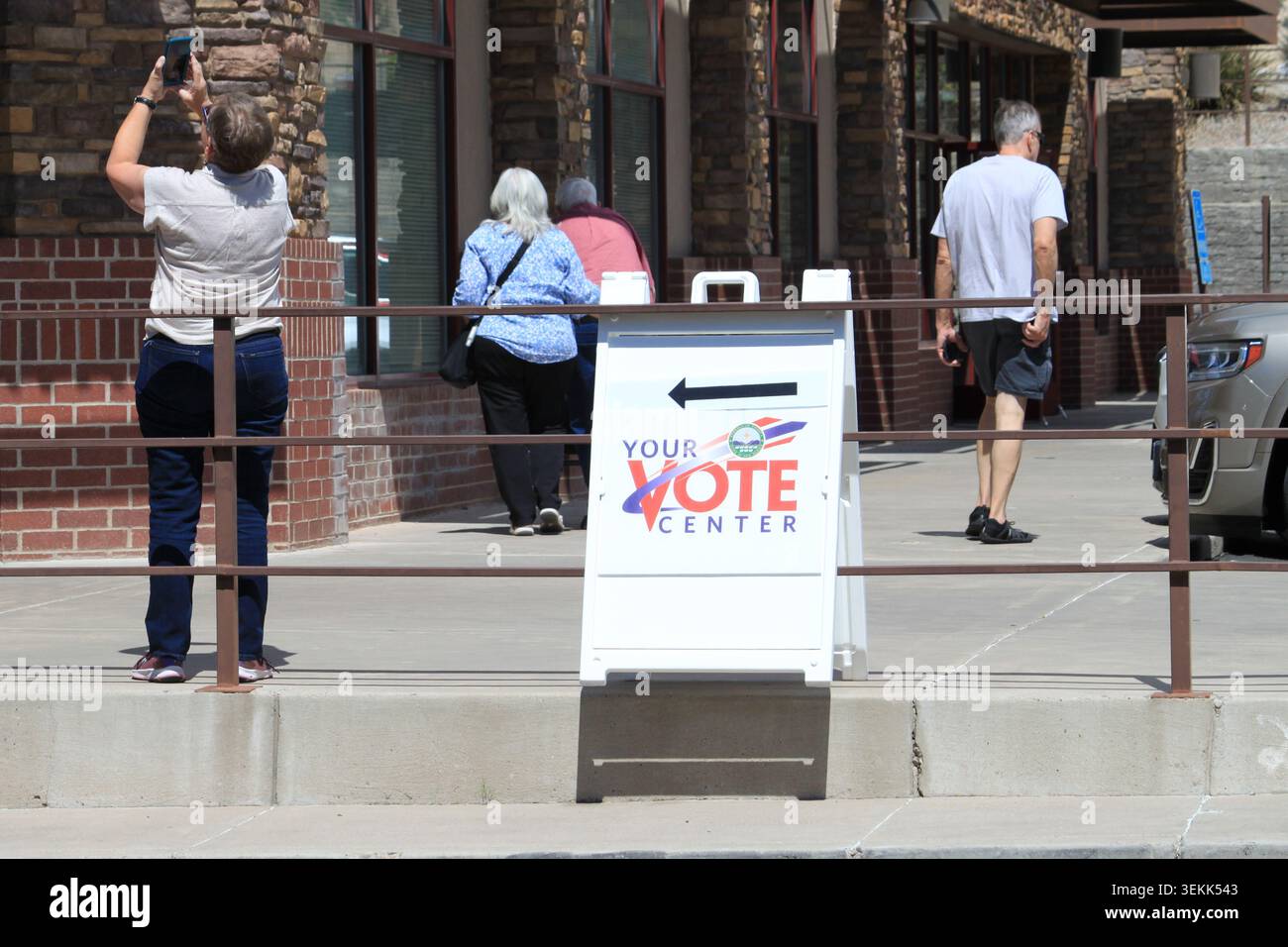 Voters depart a polling site in Albuquerque, New Mexico, on Tuesday ...