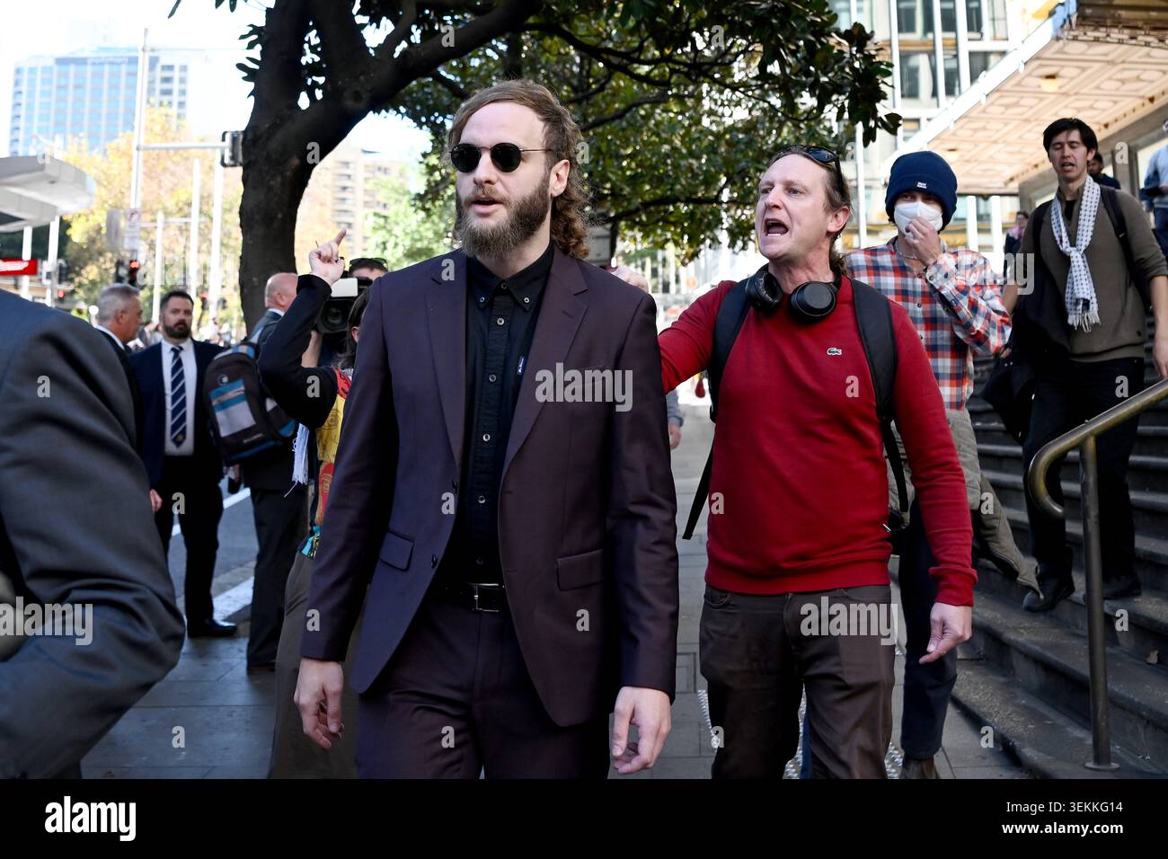 Joel Davis (left) departs the Downing Centre Court, Sydney, Wednesday ...