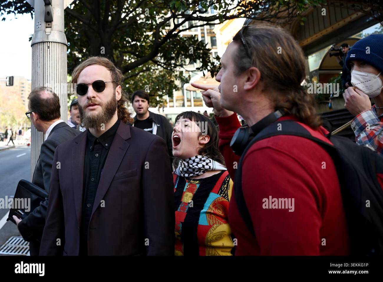 Joel Davis (left) is accosted by pro Palestine protesters as he departs ...