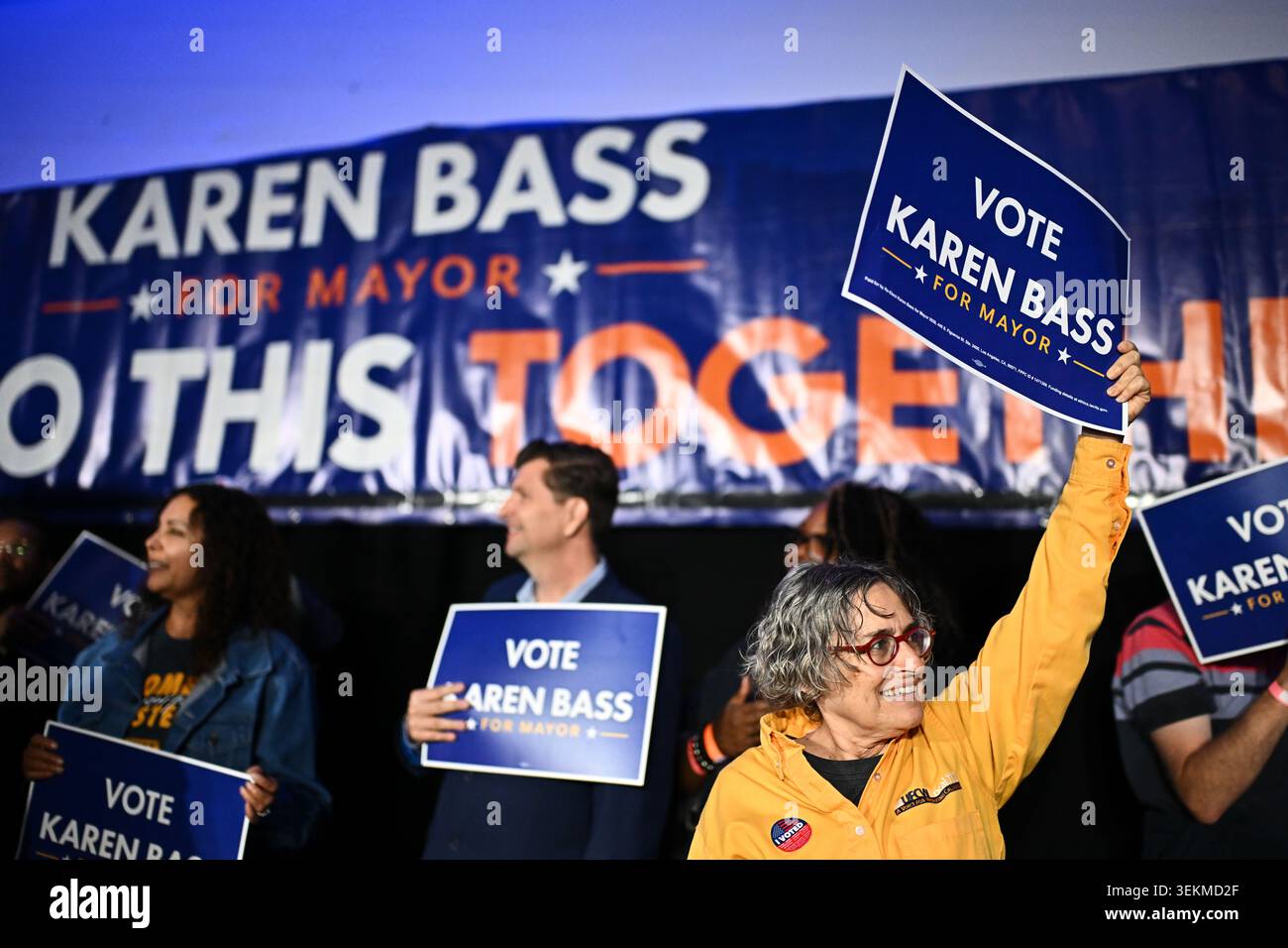 Supporters of Los Angeles Mayor Karen Bass hold signs during an ...