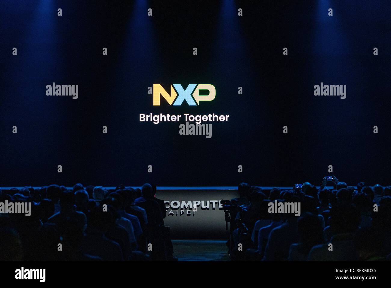An NXP Semiconductors logo on the screen at a keynote at Computex 2026 ...