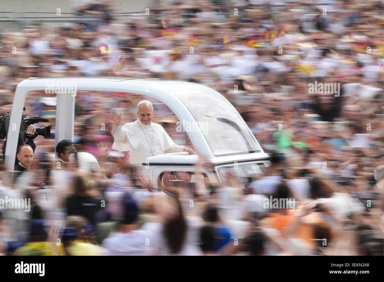 Pope Leo XIV waves as he arrives for his weekly general audience in St ...