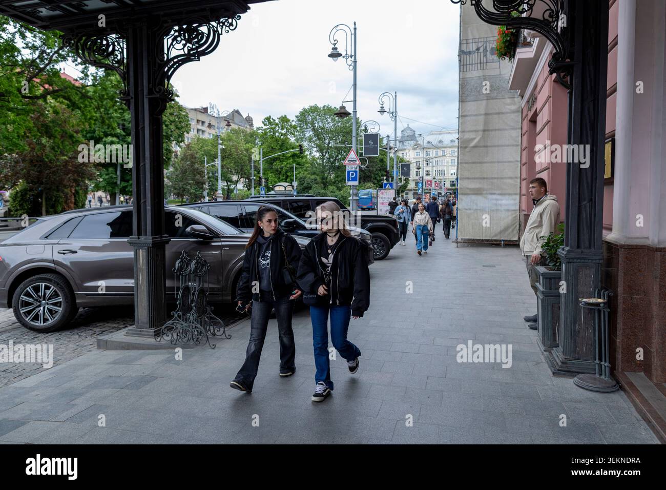 Pedestrians walk along a pavement in central Lviv on Sunday, 31 May ...