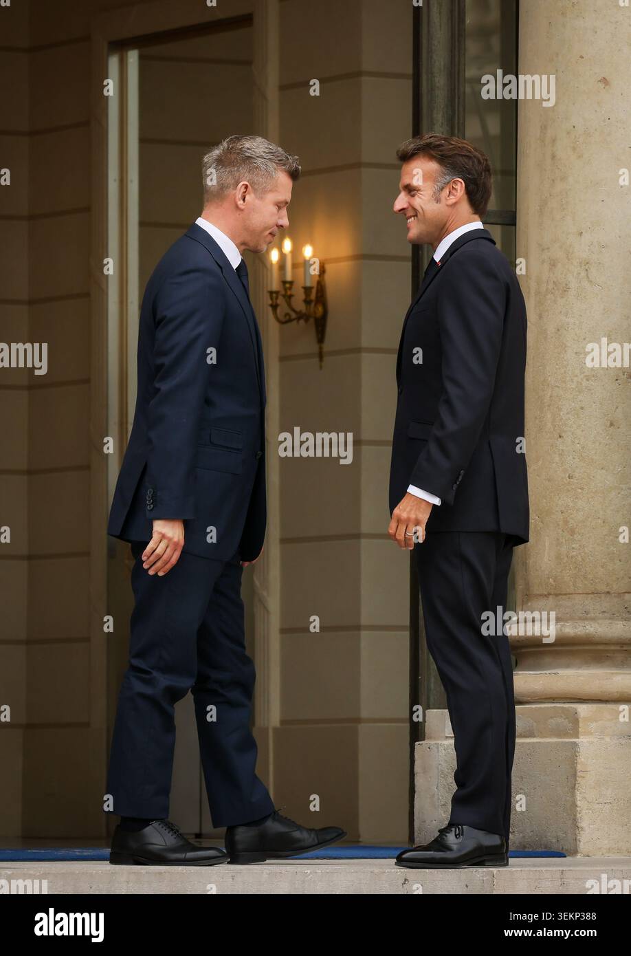 Hungary's Prime Minister Peter Magyar, let, is welcomed by France's ...