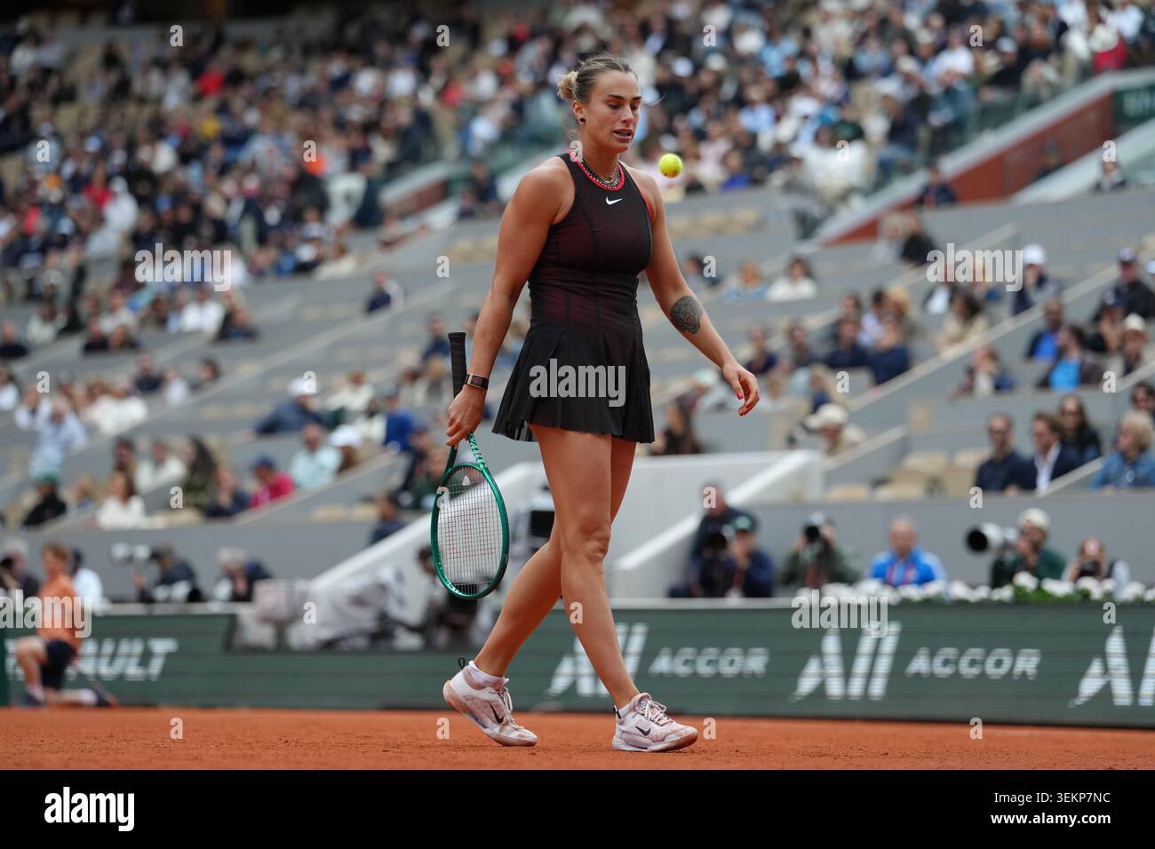 Aryna Sabalenka of Belarus walks to the base line during the ...