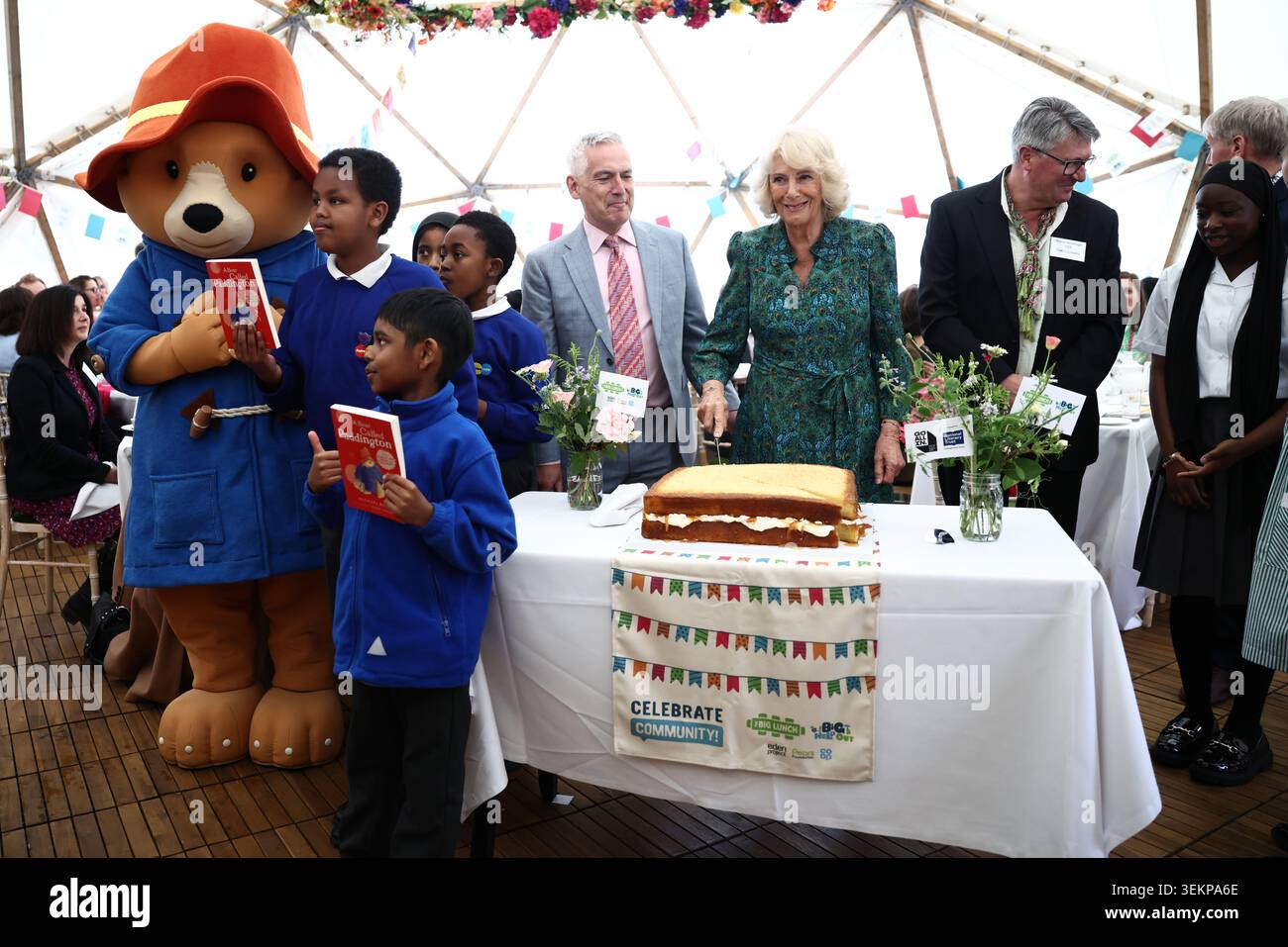 Queen Camilla cuts a cake during during a Big Lunch at the British ...