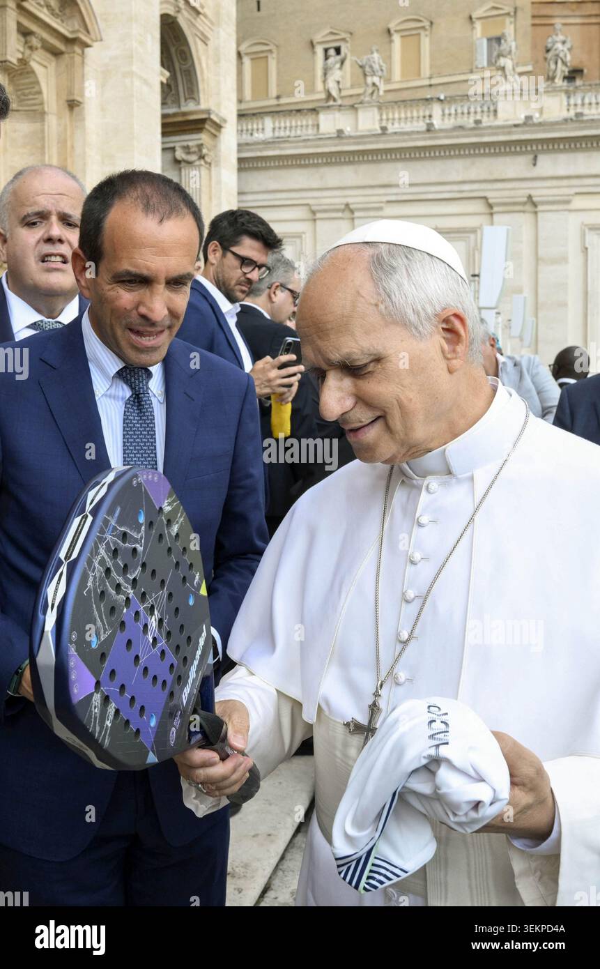 Pope Leo XIV receives a padel racket during the weekly general audience ...
