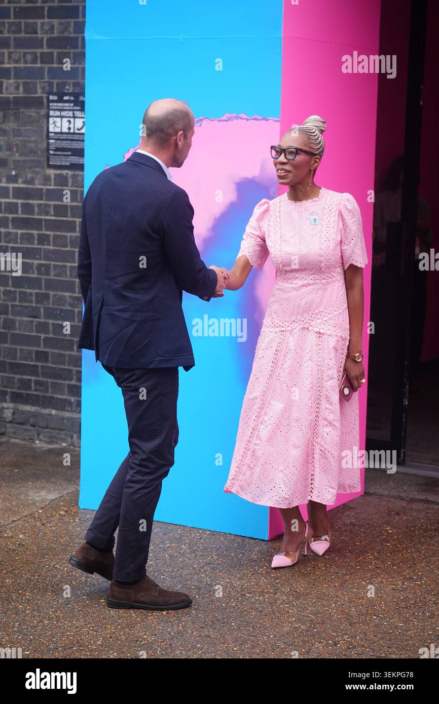 The Prince of Wales is greeted by Dr Tessy Ojo, Chief Executive, The ...