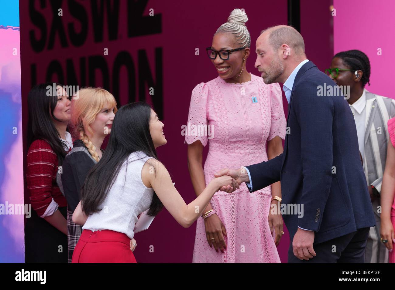 Britain's Prince William shakes hands with a winner of the Diana Award ...