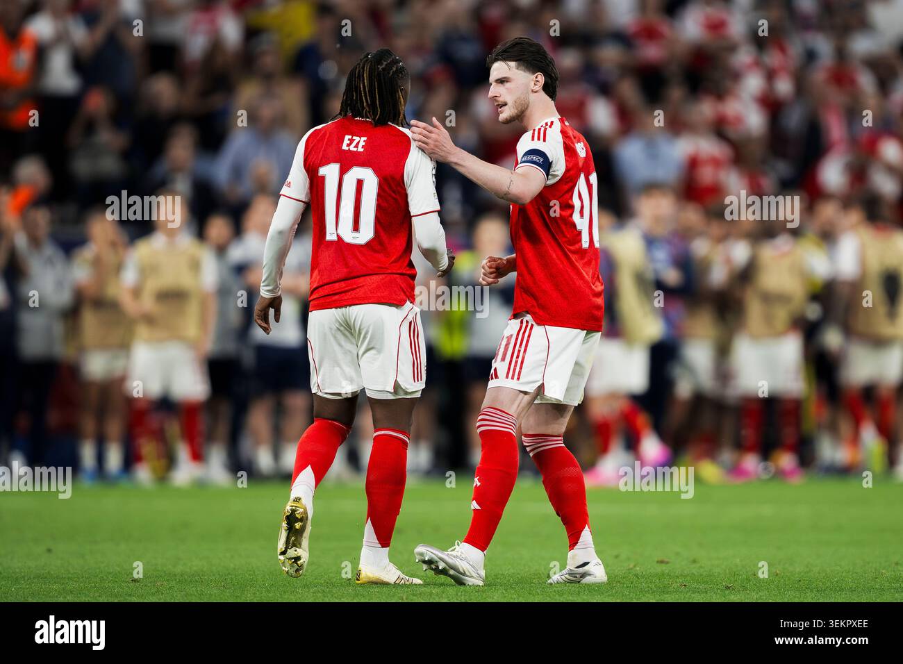 Eberechi Eze of Arsenal FC is consoled by Declan Rice of Arsenal FC ...